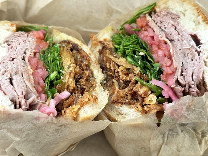 The roast beef sandwich: where beefy deliciousness meets veggie crunch in a harmony sweeter than The Beatles' greatest hits.