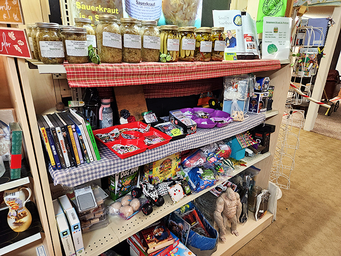 Sauerkraut and souvenirs, anyone? This shelf is a delightful mishmash of flavors and finds, proving variety truly is the spice of life.