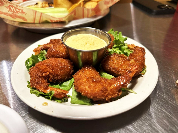 Crispy crustaceans, anyone? These shrimp are so perfectly fried, they might just convince you that seafood and landlocked states are a match made in culinary heaven.