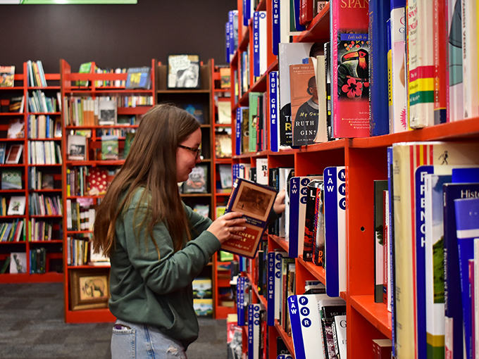 Lost in the stacks? This bookworm's on a mission! Hunting for that elusive title is half the fun at Bookmans.