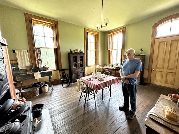 "Hmm, did I leave the iron on in 1875?" This gentleman ponders life's great mysteries in a kitchen that's seen more than a few burnt biscuits.