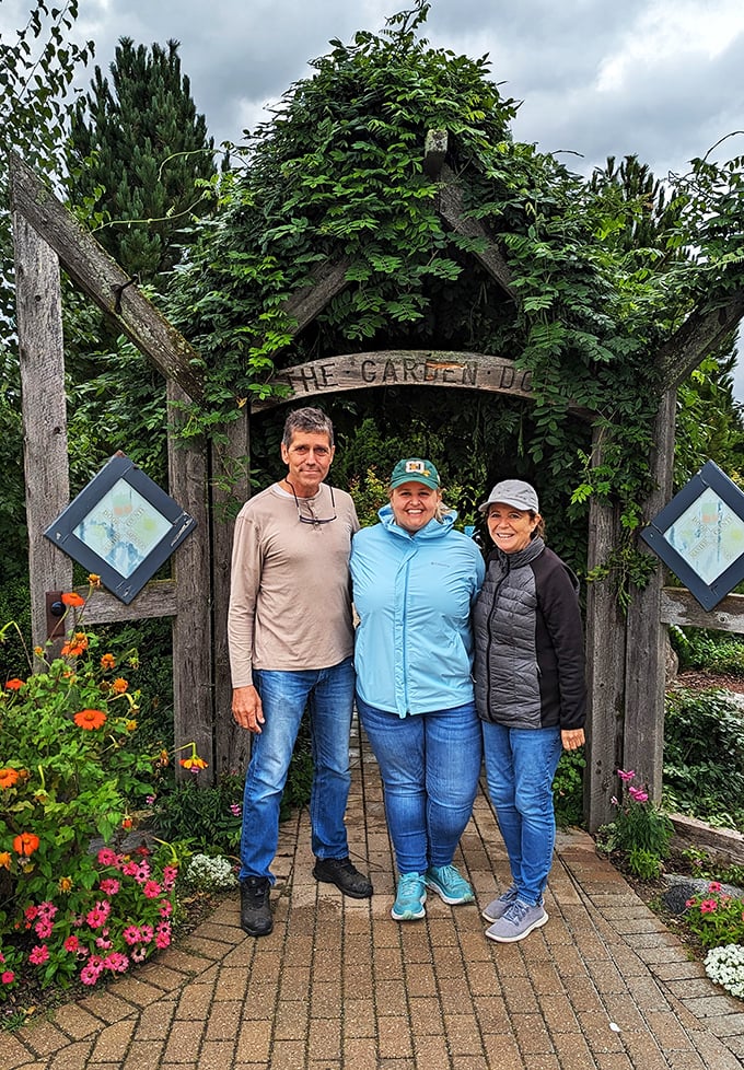 Garden groupies unite! These smiling faces at the entrance are proof that flower power is still alive and well. Peace, love, and pollination, man!