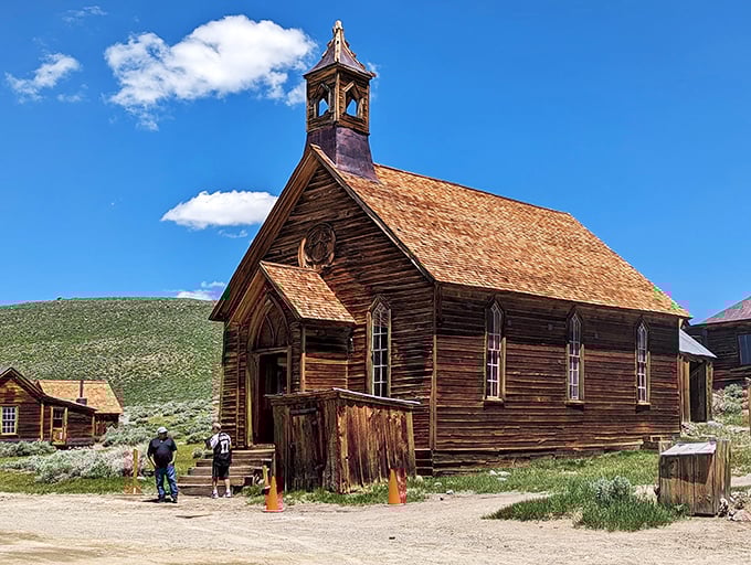 "Holy ghost town, Batman!" The weathered church beckons to visitors, its steeple reaching skyward like a celestial time machine.