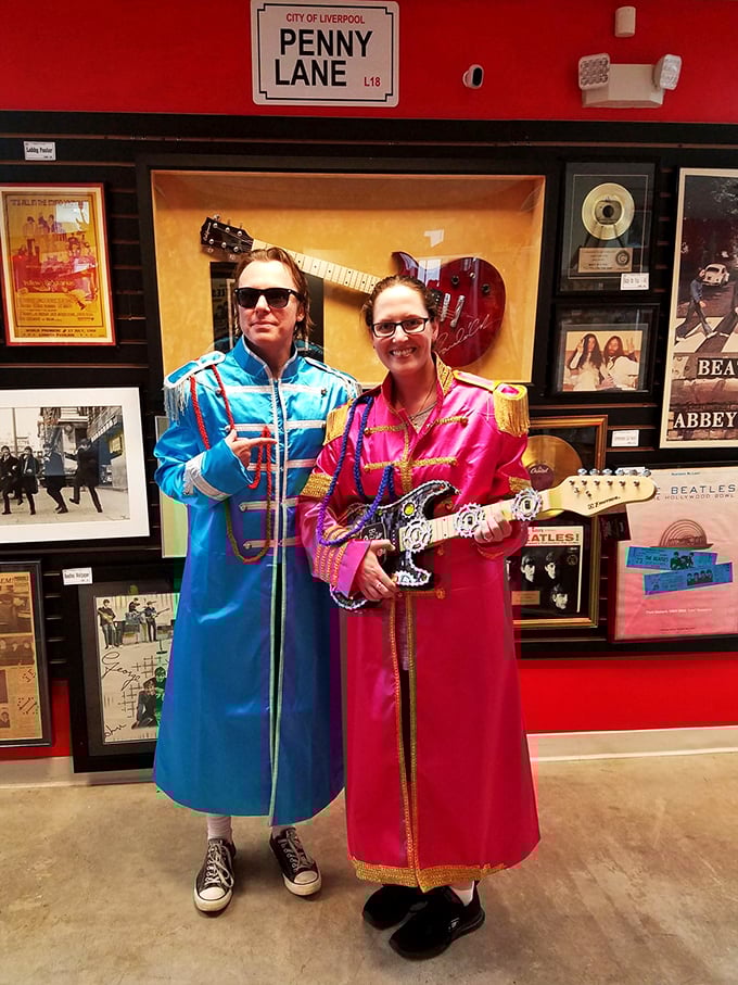 Groovy getups alert! These visitors are channeling their inner Lennon and McCartney, proving that Beatlemania is alive and well in the Sunshine State.