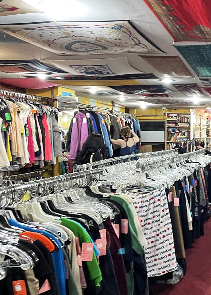 Treasure hunters in their natural habitat. Watch as they navigate the sea of hangers with the skill of seasoned explorers.