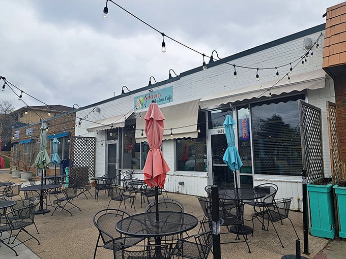 Guava's Cuban Cafe: Splash some color into your day! This vibrant patio is like a Cuban artist's palette come to life, promising flavors as bold as its decor.