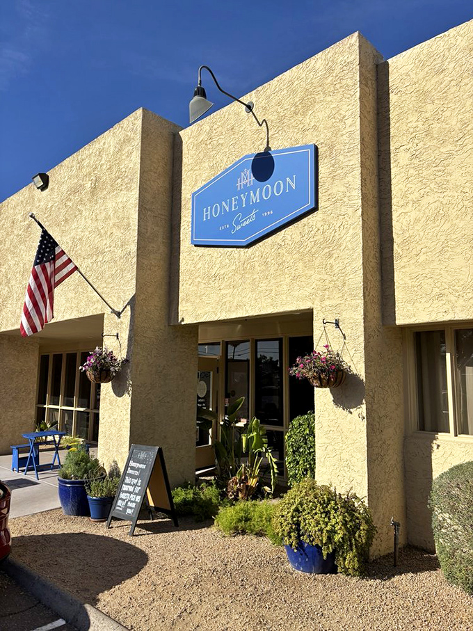 Honeymoon Sweets Cafe: Where every bite feels like falling in love. This charming exterior could make even the Grinch's heart grow three sizes.