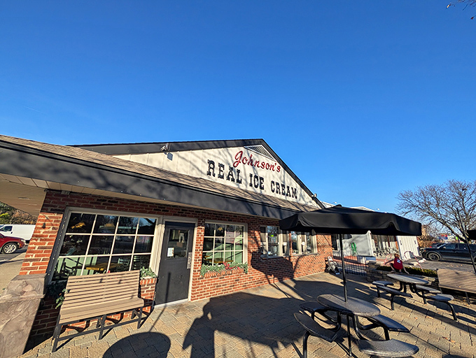 Johnson's keeps it "real" with ice cream that's authentic as a Norman Rockwell painting. Their sign is practically daring you not to smile.