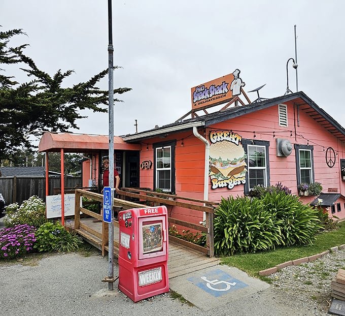 Phil's Snack Shack: Where "snack" is clearly an understatement! This coral-pink paradise promises burgers that'll make your taste buds dance.