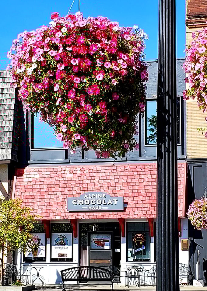 Blooming beauty meets chocolate mastery. It's as if Mother Nature and Willy Wonka joined forces to create the perfect storefront.
