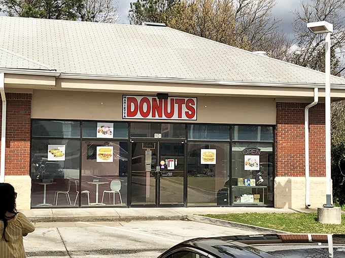 Donut judge a book by its cover! This simple storefront is serving up rings of joy that'll have you doing cartwheels (or at least contemplating them).