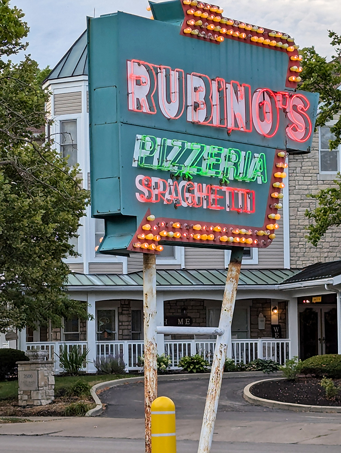 Part pizzeria, part time machine. Rubino's neon glow promises a trip back to when calories were just a twinkle in nutritionists' eyes.