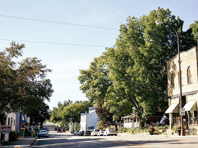 Main Street Stockholm: Small town, big heart. Colorful storefronts and tree-lined streets make this riverside village a hidden gem.