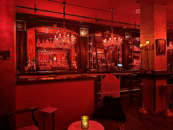 Red lights, plush seats, and a bar that glows like the pearly gates. It's heaven on earth, with a dash of devilish fun!
