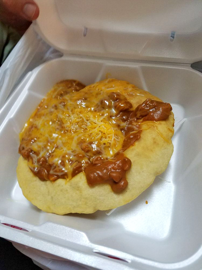 Fry bread fantasy! This bean and cheese creation is like a pillow of deliciousness that'll make you want to take a siesta.