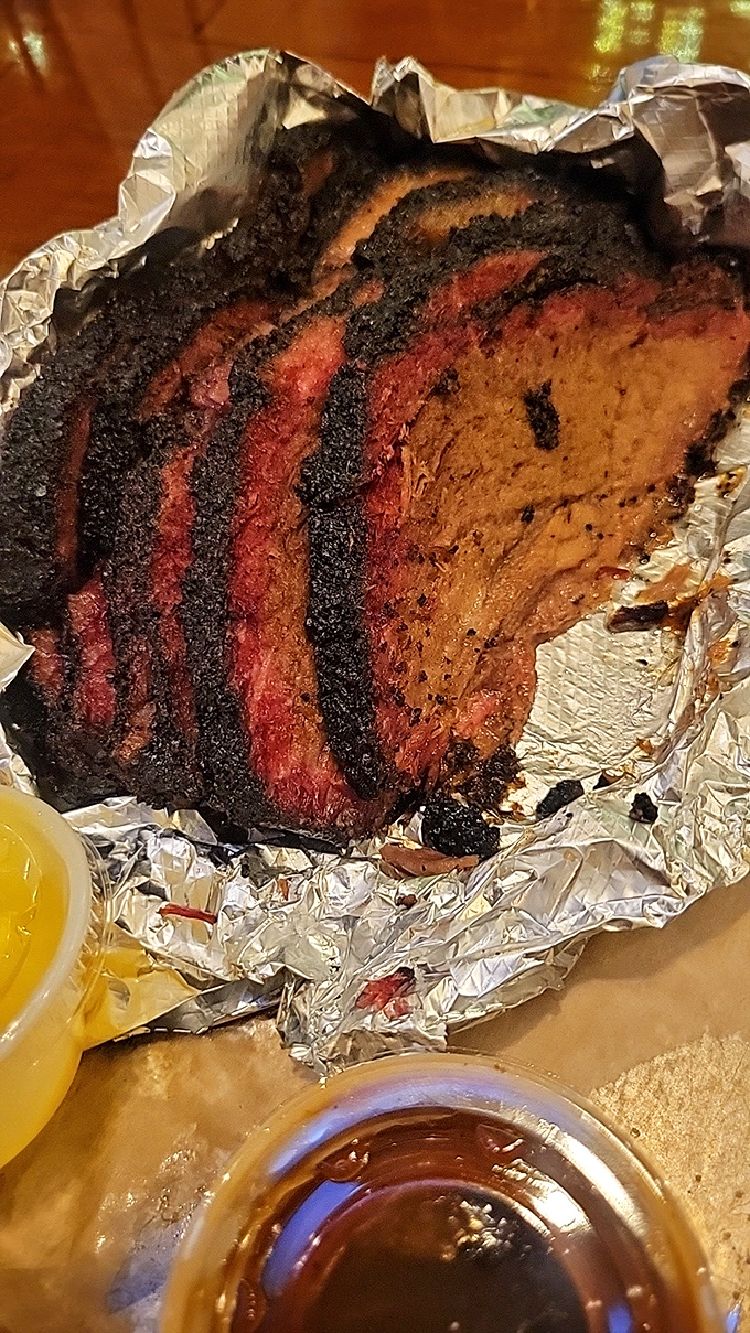 Smoke rings that could make an Olympic athlete jealous. This brisket has more layers than a Shakespeare play.