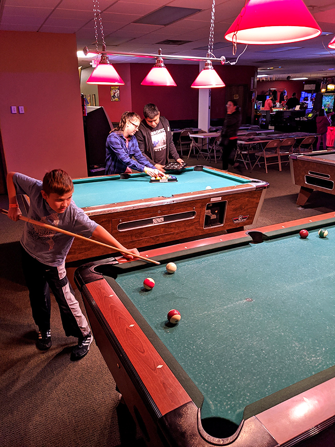 Rack 'em up! Between button-mashing sessions, test your aim on the billiards table. Just don't confuse the cue ball with Pac-Man, okay?