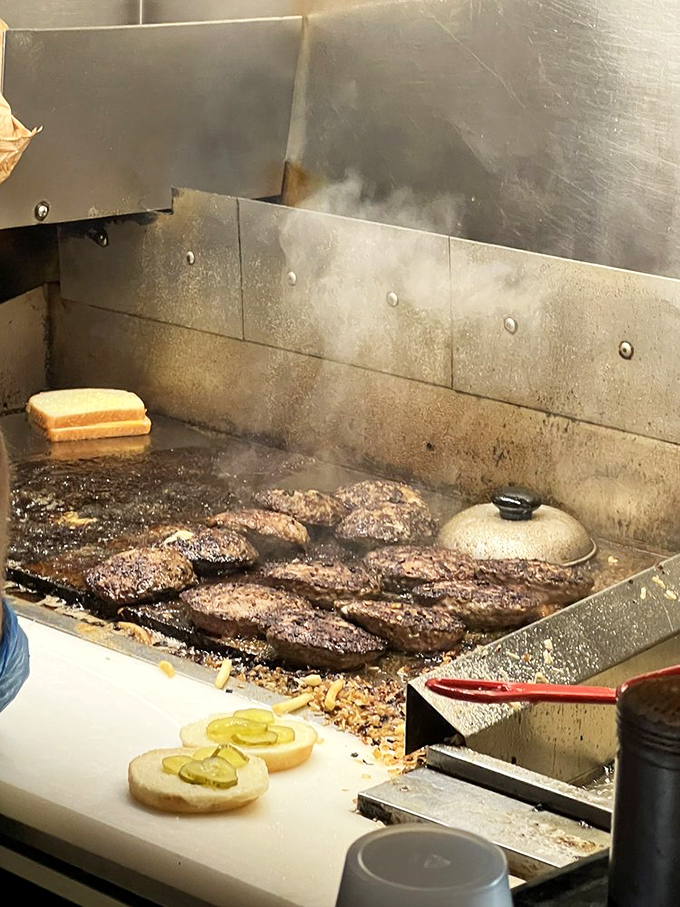 Sizzle, sizzle, pop! Watch the magic happen as these beefy beauties transform into cheesy wonders on the well-seasoned grill.