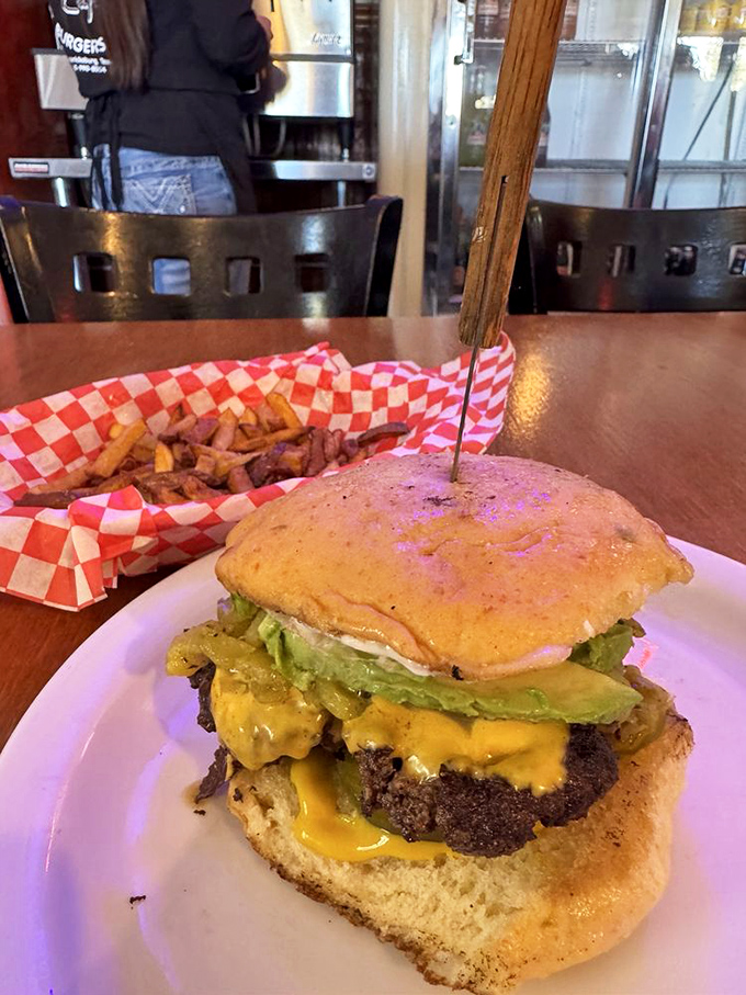 Caramelized onions cascading down this burger like a savory waterfall? Yes, please!