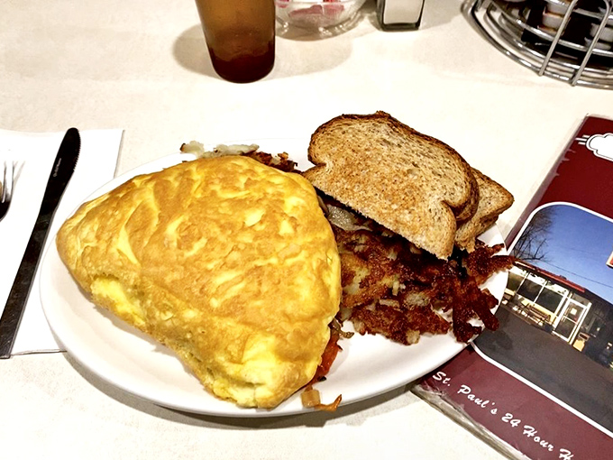 Omelets so fluffy, they could double as pillows. Paired with hash browns that are crispier than your grandpa's jokes at Thanksgiving dinner.