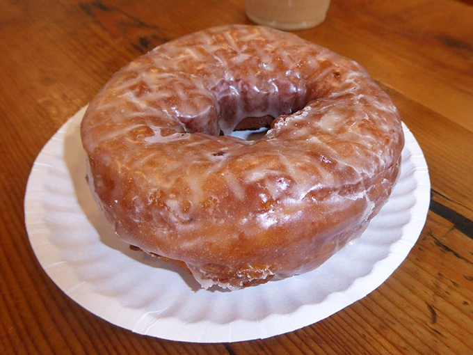 Meet the donut that thinks it's a cinnamon roll. This sweet potato ginger creation is the comfort food hug your soul didn't know it needed.
