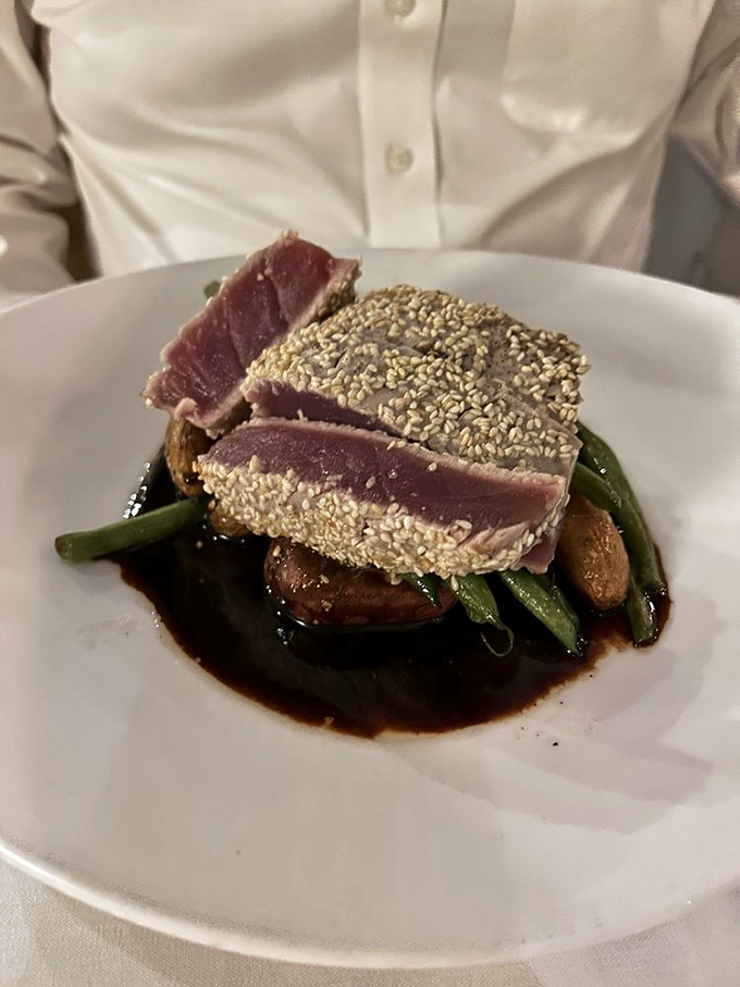 Tuna that's dressed to impress. With its sesame seed crust, it's like the James Bond of the seafood world - sophisticated and irresistible.