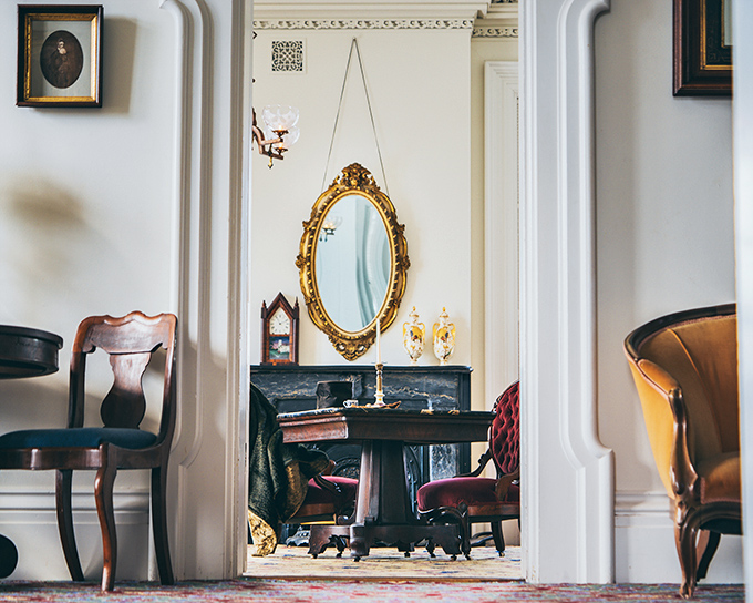 Time-travel chic at its finest. That pink chair's seen more drama than a season of "Downton Abbey."