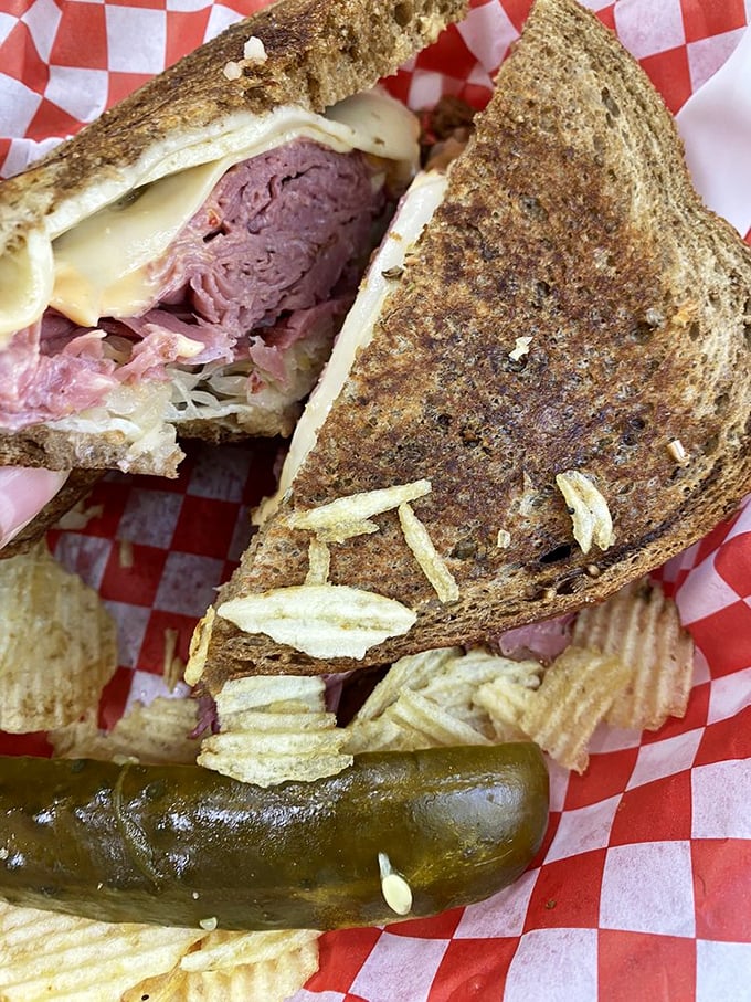 Move over, Lady Liberty – there's a new icon in town! This Reuben stands tall and proud, a beacon of hope for hungry masses yearning to eat free.