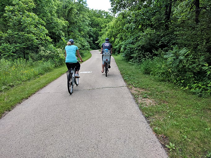Pedal your way to serenity. This bike trail is smoother than a jazz saxophone solo, winding through a green symphony of leaves.