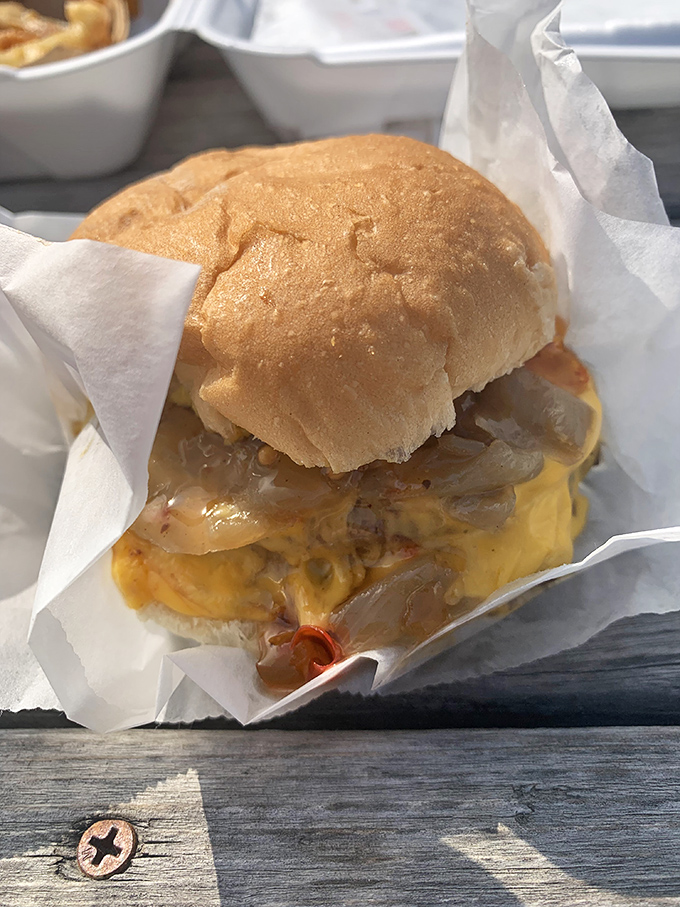 Behold, the cheeseburger of your dreams! Melty cheese cascades over a juicy patty, nestled in a soft bun &ndash; it's love at first bite.