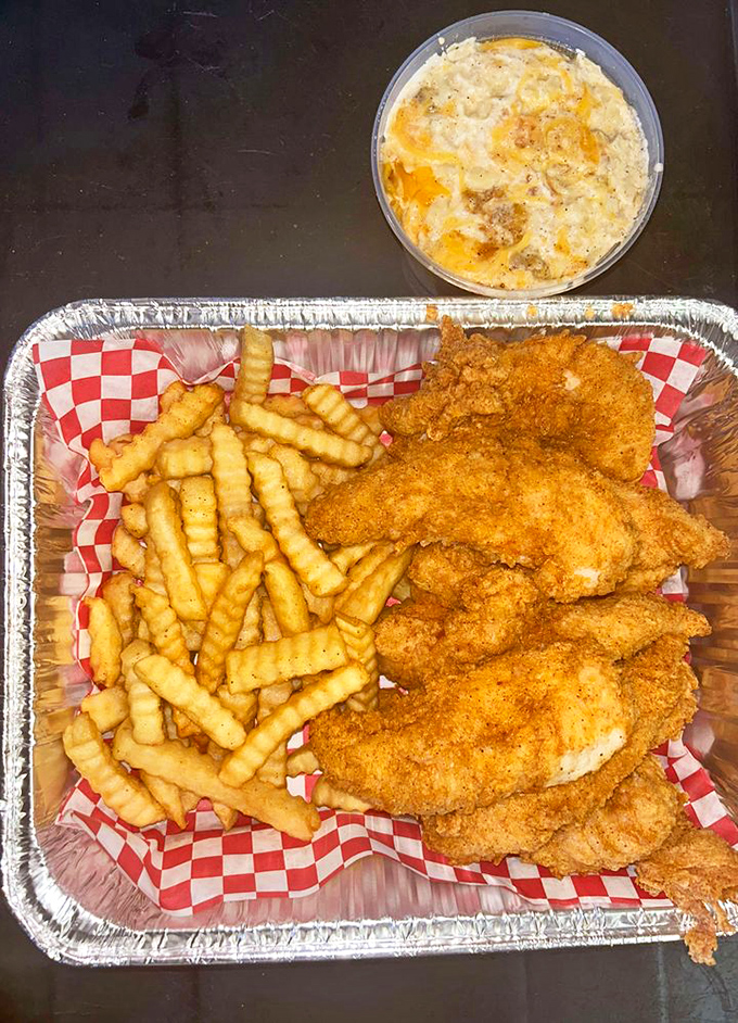 Comfort food jackpot! Crispy chicken, cheesy mac, and potato wedges - it's like your grandma's cooking got an MBA in deliciousness.