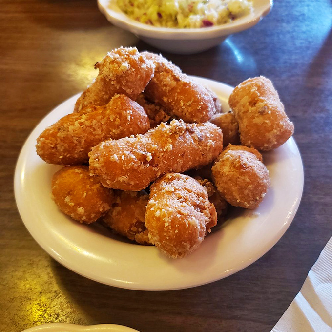 Corn fritter nirvana! These golden nuggets of joy are like edible sunshine &ndash; crispy, sweet, and utterly addictive.