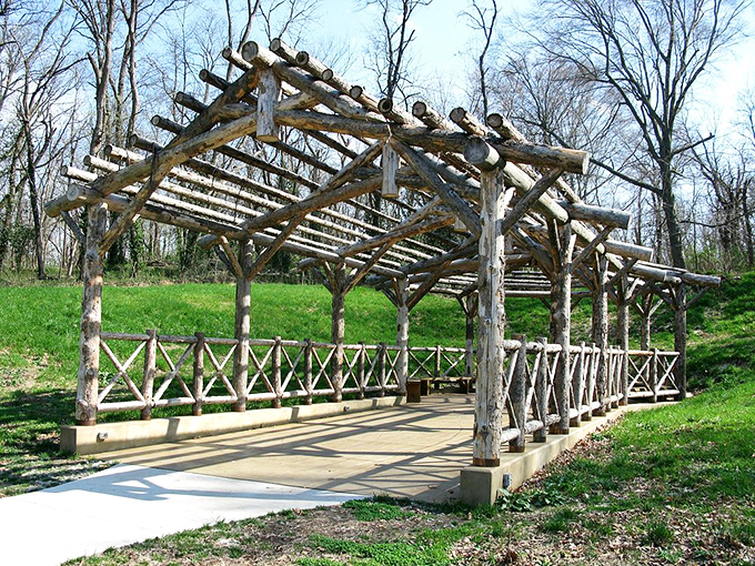 Nature's cathedral: This rustic wooden archway invites wanderers into a leafy sanctuary. Indiana Jones, eat your heart out!