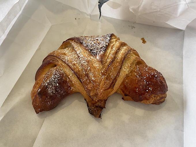 Flaky, golden, and ready for its close-up. This croissant is auditioning for the lead role in "Breakfast of Champions."