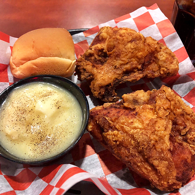 Comfort on a plate! Sneaky's fried chicken and creamy mashed potatoes are like a warm hug for your taste buds.