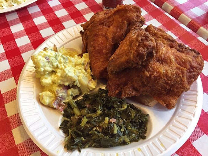 A Southern feast fit for royalty! This spread has more sides than a dodecahedron, proving that at Gus's, chicken may be king, but its court is equally impressive.