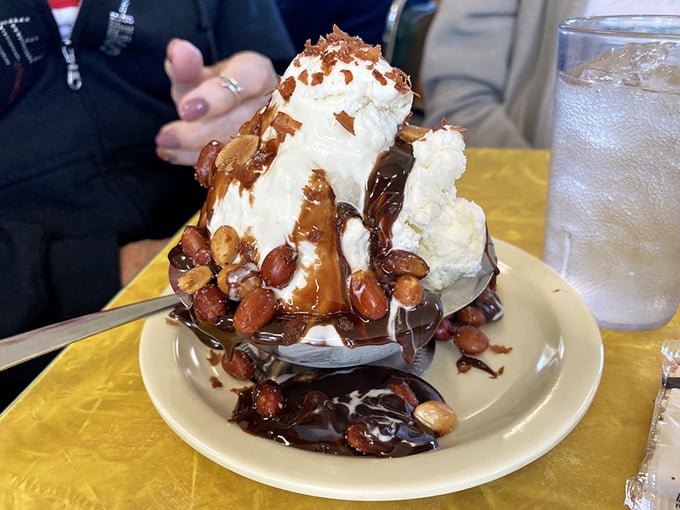 Holy moly, it's the Leaning Tower of Ice Cream! This sundae defies gravity and common sense in the most delightful way.