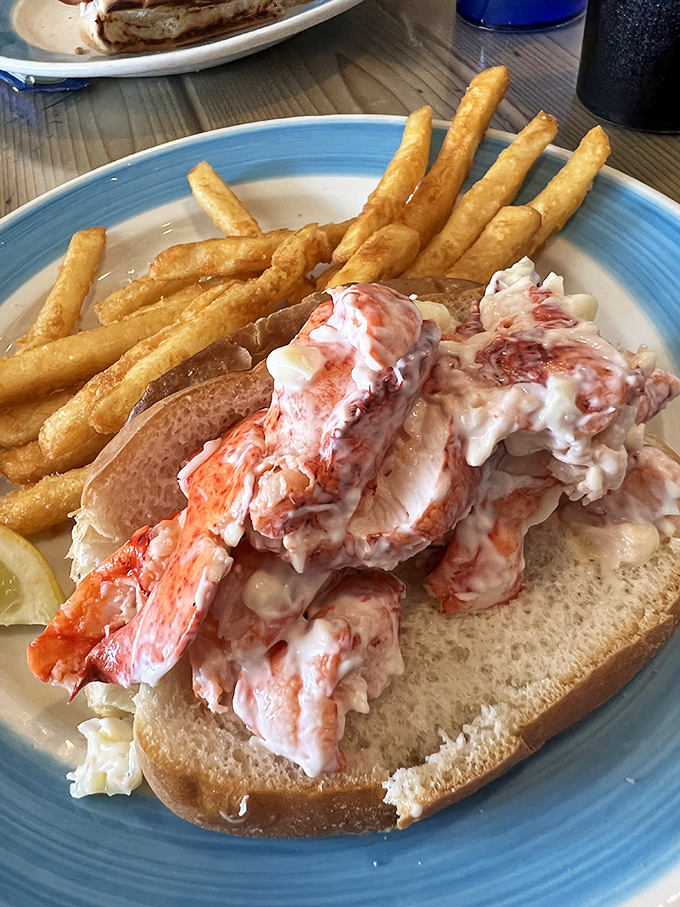 The lobster roll of your dreams has arrived! This beauty is so packed with meat, it's practically doing bicep curls.