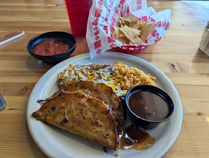Navajo tacos: where fry bread meets fiesta. It's like a edible sombrero for your taste buds!