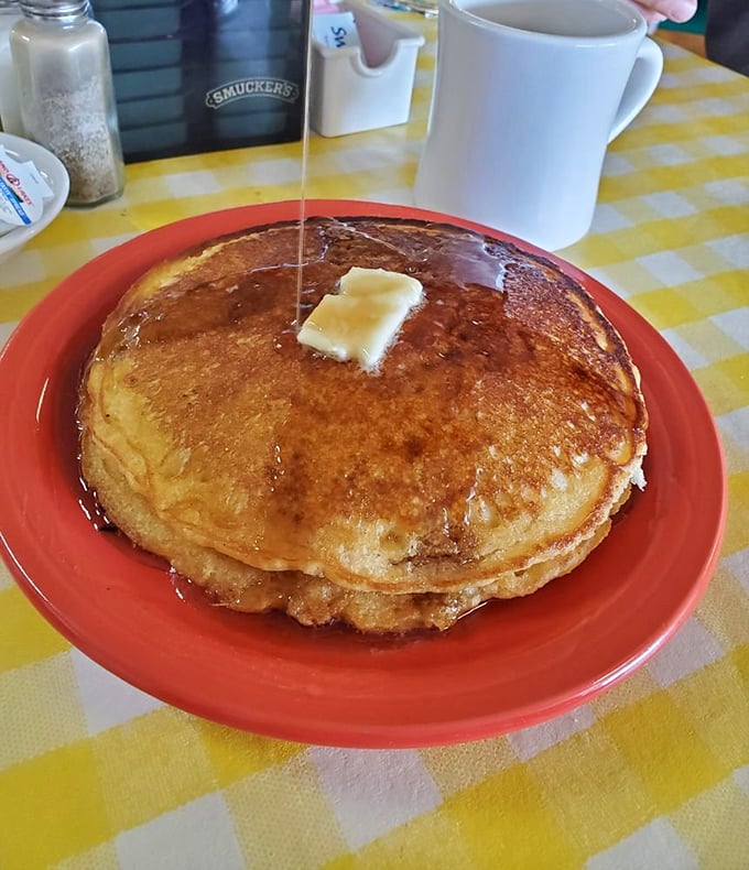 Pancakes so fluffy, they could double as pillows. Warning: May induce spontaneous naps and uncontrollable smiles.