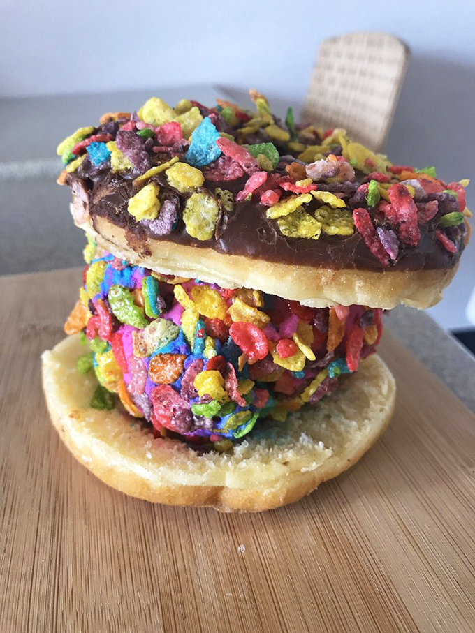 Move over, unicorn frappuccinos! This rainbow-hued creation is what happens when a donut dreams big. It's a party for your palate!