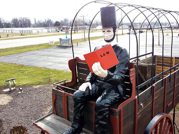 "Four score and seven... feet off the ground?" Abe's lofty perch gives 'highbrow literature' a whole new meaning.