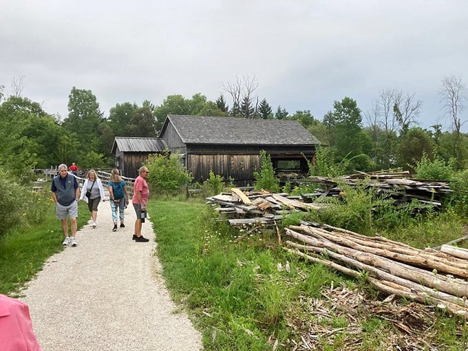 Visitors stroll along paths once trodden by pioneers. It's amazing how far we've come &ndash; from horse-drawn wagons to electric scooters!