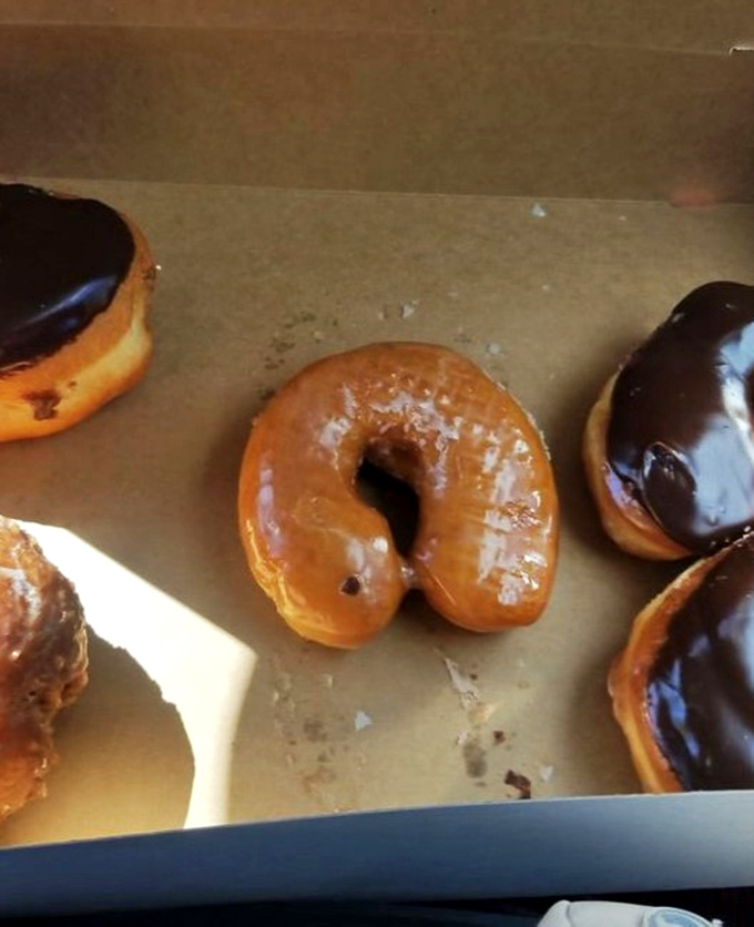 The classic glazed donut: simple, elegant, and utterly irresistible. It's the little black dress of the pastry world – always in style.