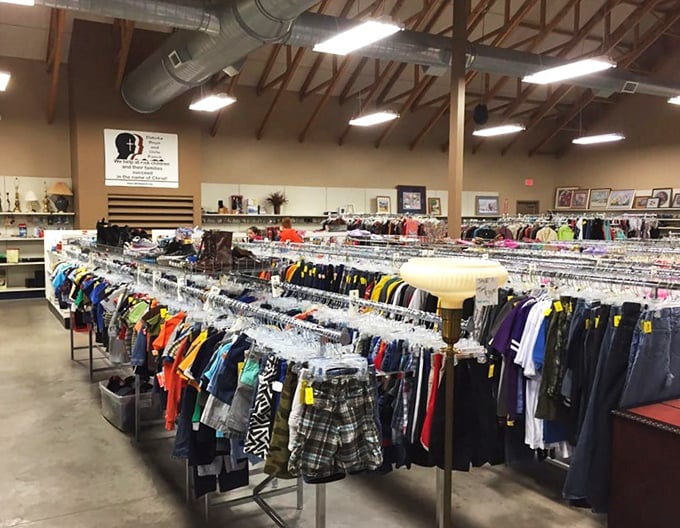 A rainbow of recycled fashion! These racks are like a colorful time machine, offering styles from every era imaginable.