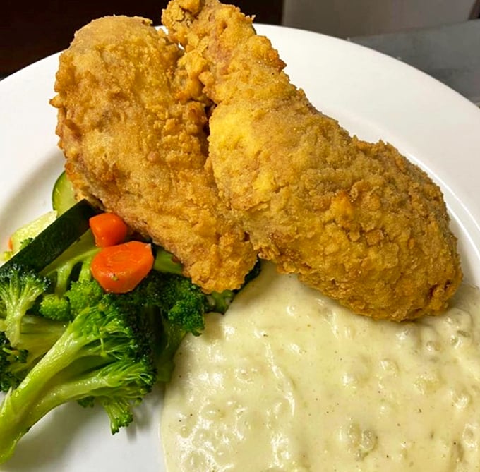 These aren't just drumsticks; they're flavor-packed wands of culinary magic. Paired with vibrant veggies and creamy sauce, it's a balanced meal that even your doctor might approve.