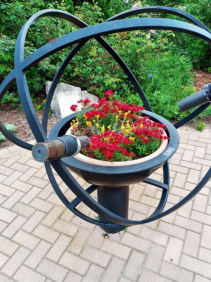 Talk about a cosmic garden! This sculptural planter looks like it's about to blast off to Planet Petunia. Houston, we have a blossom!