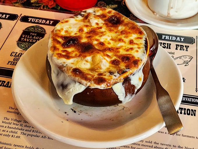 Behold, the French onion soup that launched a thousand sighs. That cheese pull could win an Olympic medal in stretchiness.