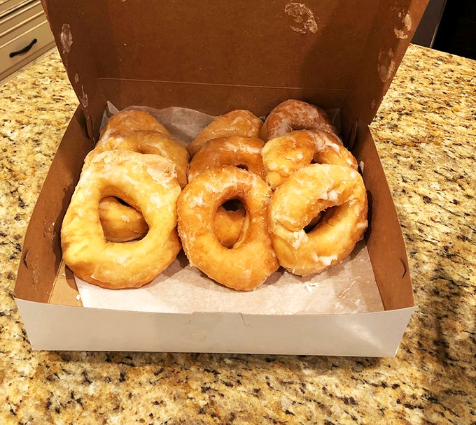 Pillowy perfection! These classic glazed donuts are so light, they might float away if not for their sweet, shiny armor.