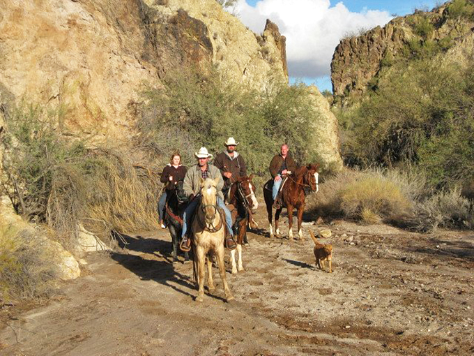 Giddy up! These modern-day cowboys (and cowgirls) are living the dream, exploring Wickenburg's breathtaking canyons on horseback. John Wayne would be proud.